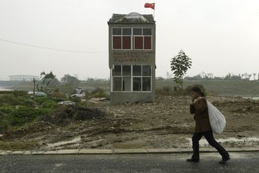 Ces maisons-clous qui résistent aux bulldozers - En Chine